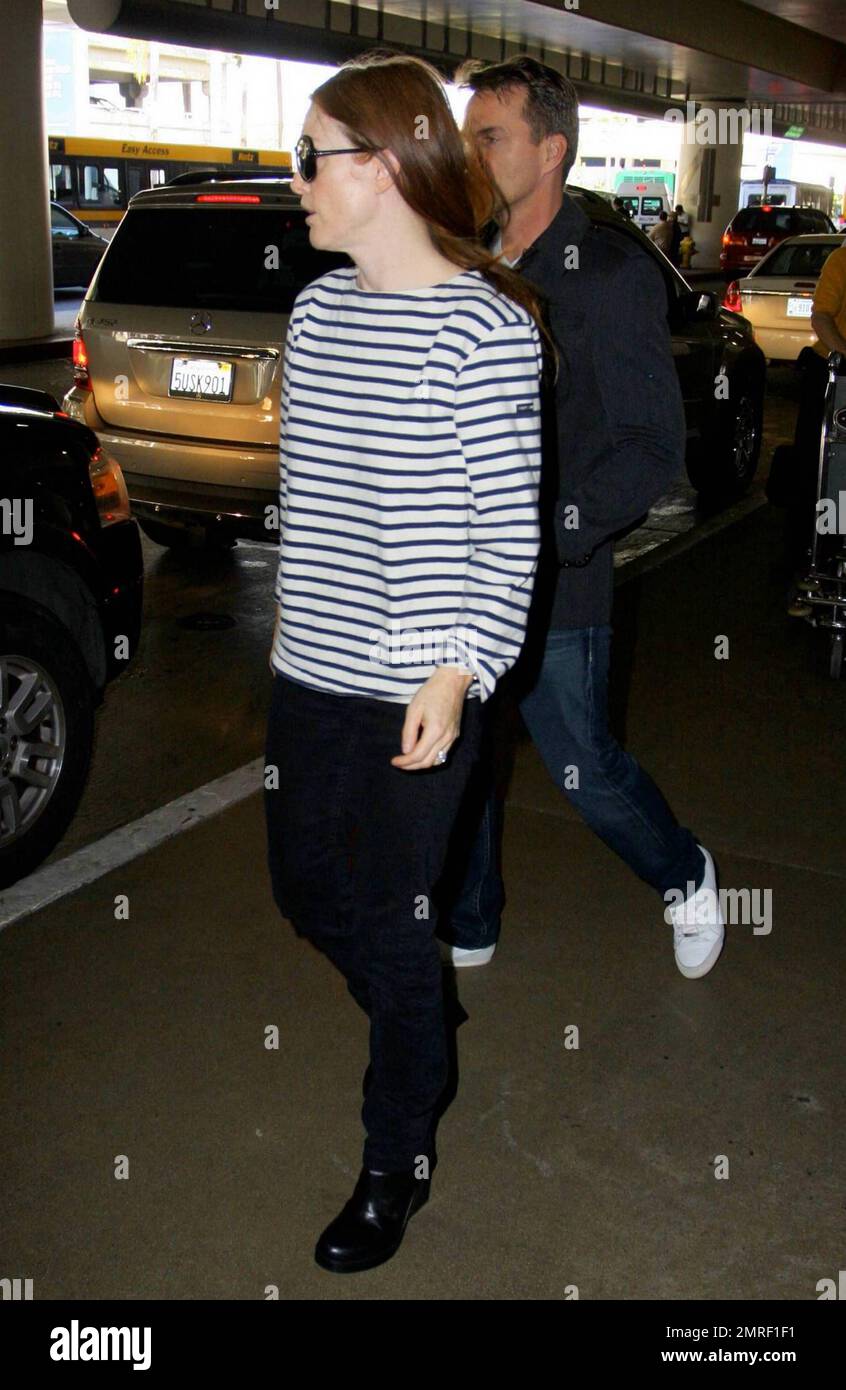 EXCLUSIVE!! Actress Julianne Moore looks tired as she arrives at LAX ...