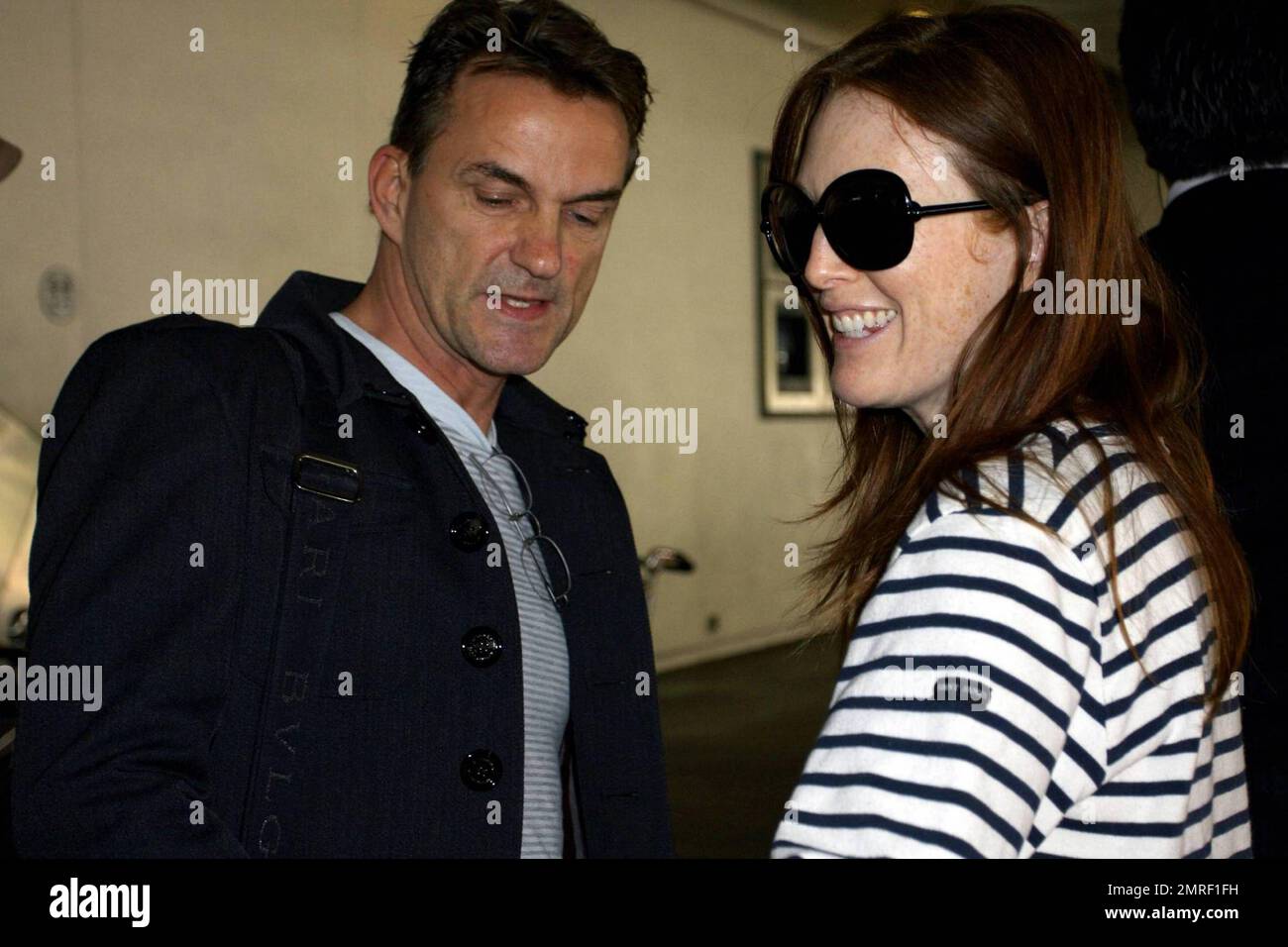 EXCLUSIVE!! Actress Julianne Moore looks tired as she arrives at LAX ...