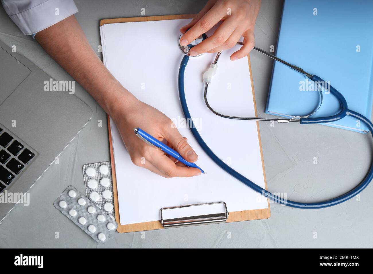 Doctor working at desk in office, top view. Medical service Stock Photo ...