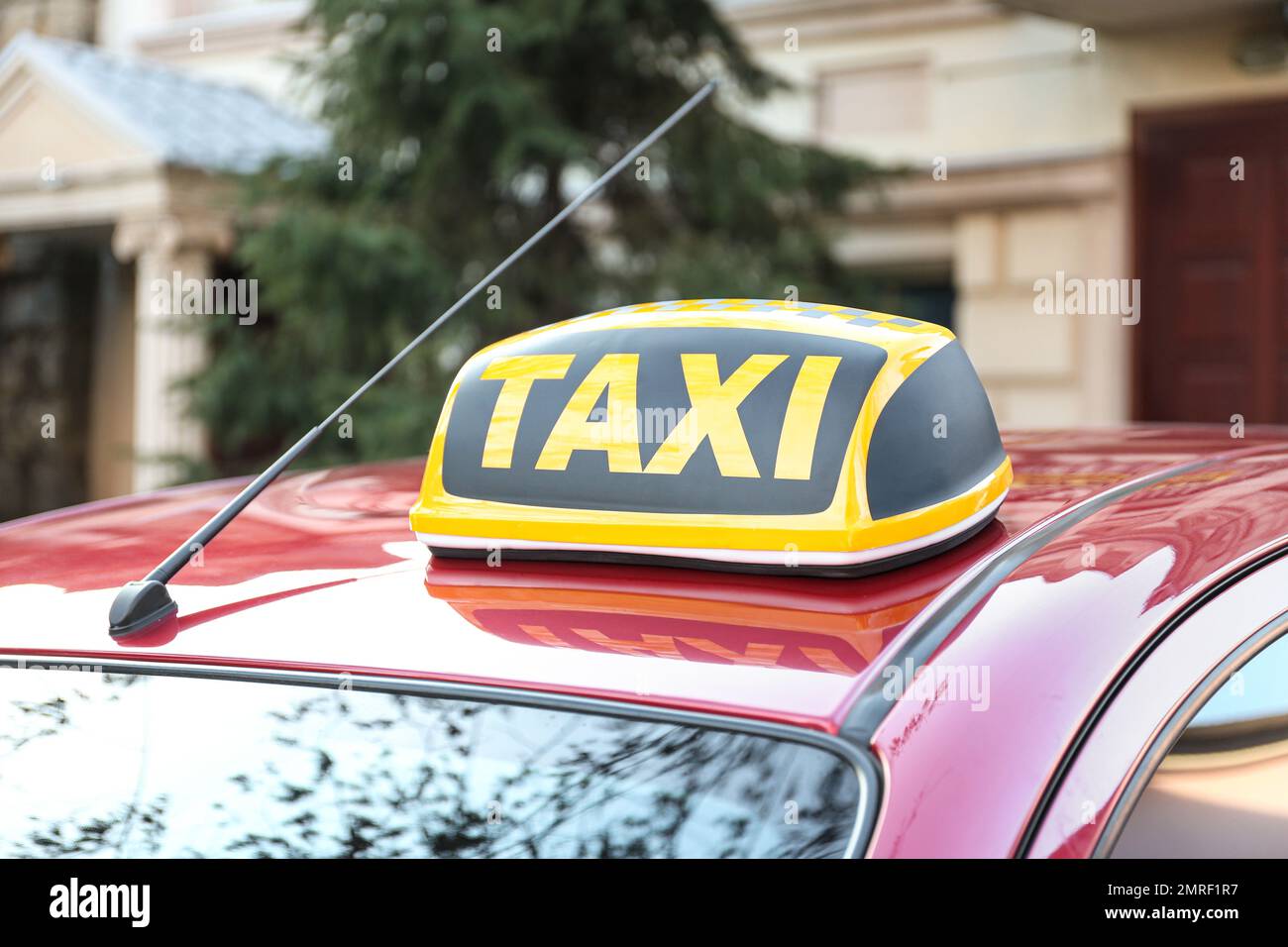 Roof light with word TAXI on car outdoors Stock Photo - Alamy