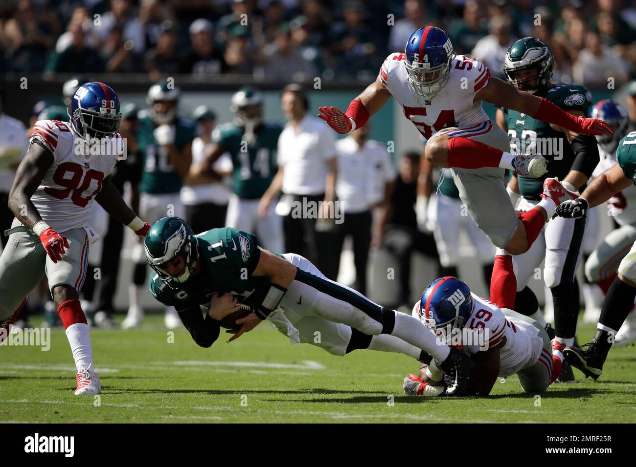 Philadelphia Eagles' Carson Wentz (11) is tackled by New York Giants ...