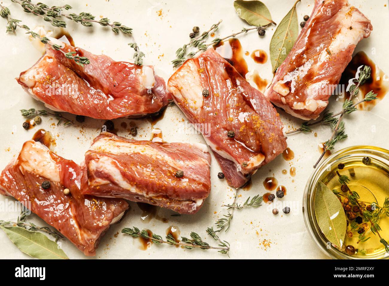 Raw marinated ribs with thyme and peppercorn, flat lay Stock Photo - Alamy