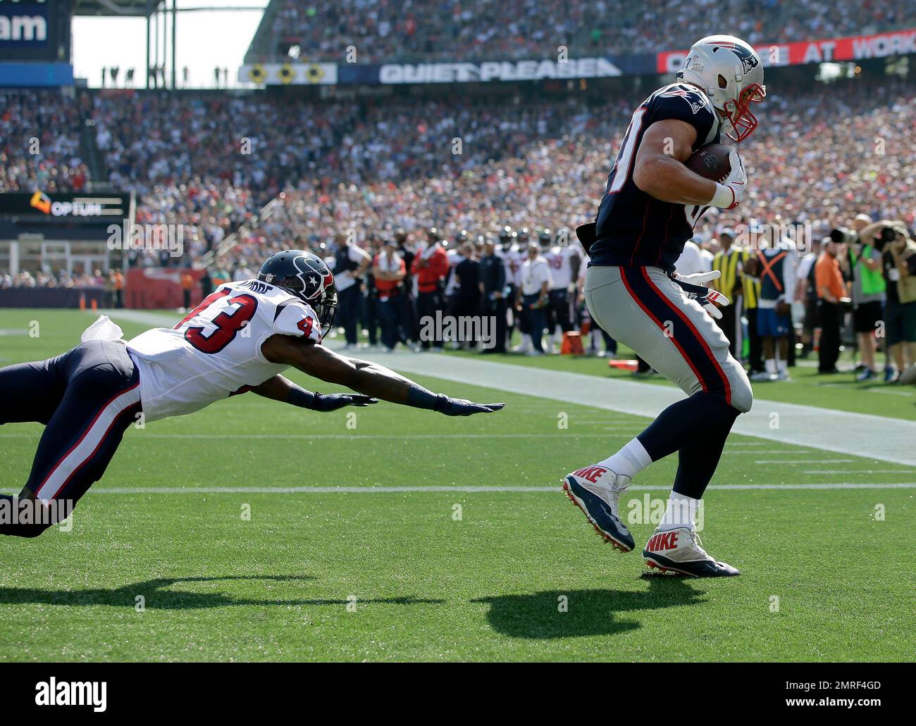 New England Patriots tight end Rob Gronkowski, right, catches a ...