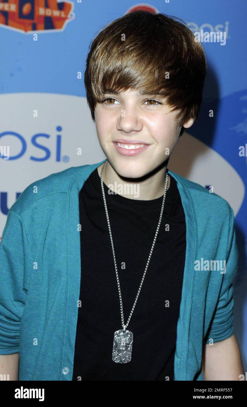 Justin Bieber appears at a press conference before performing at the ...