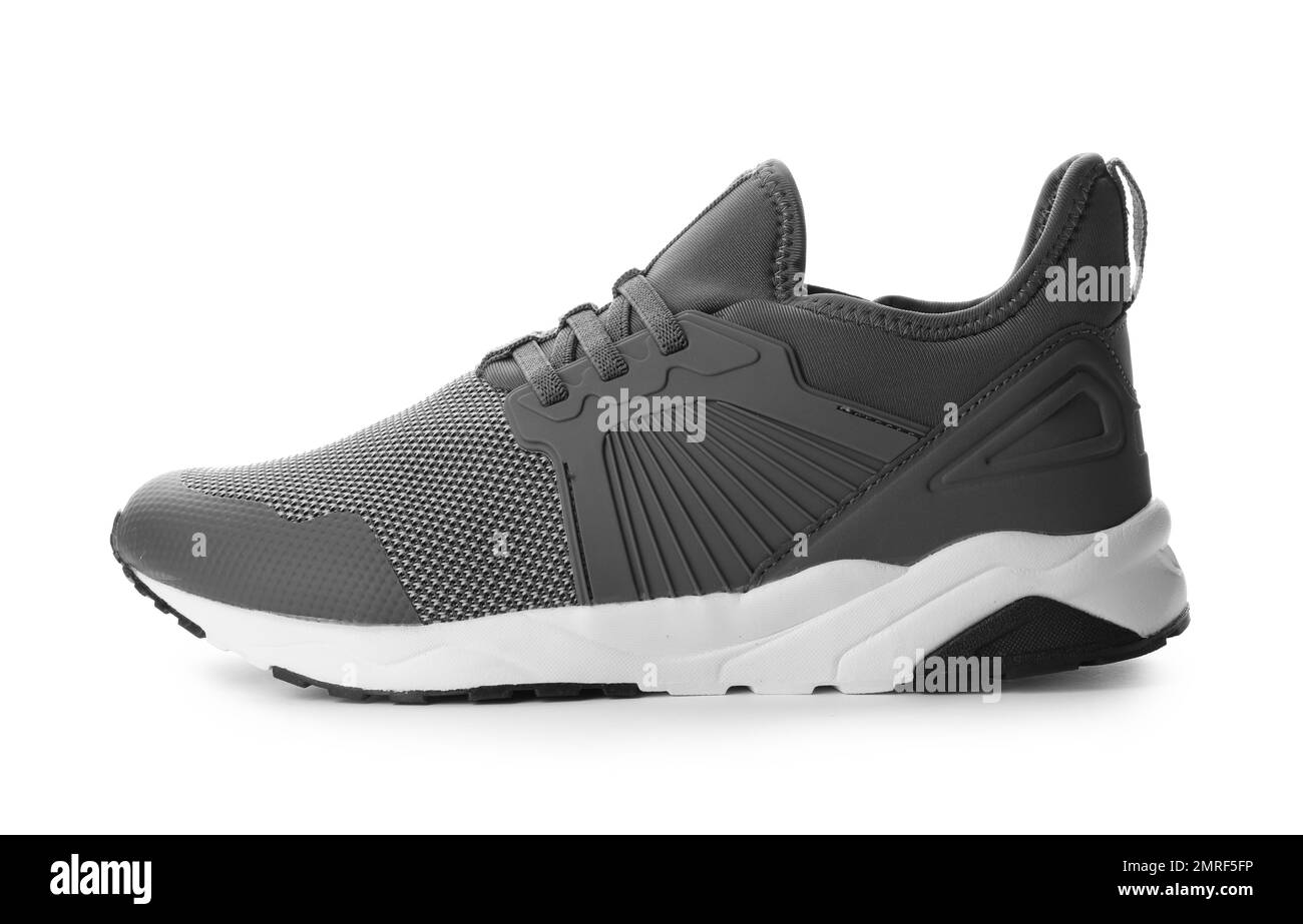 Stylish grey sports shoe isolated on white Stock Photo - Alamy
