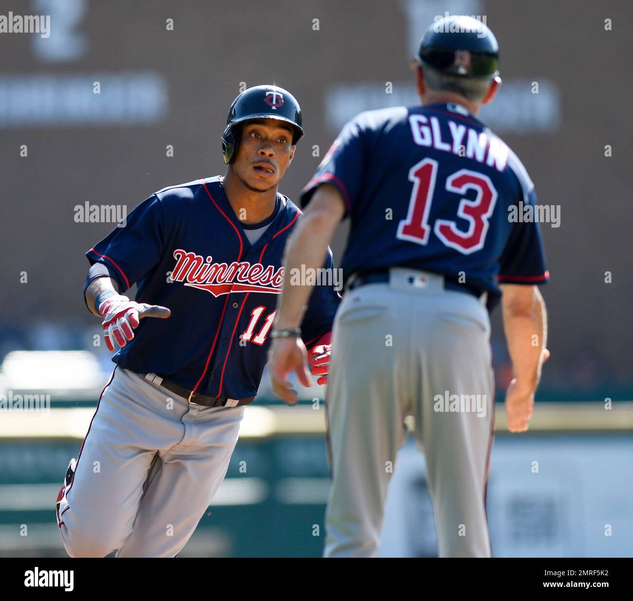 Minnesota Twins' Jorge Polanco (11) is congratulated by third base ...