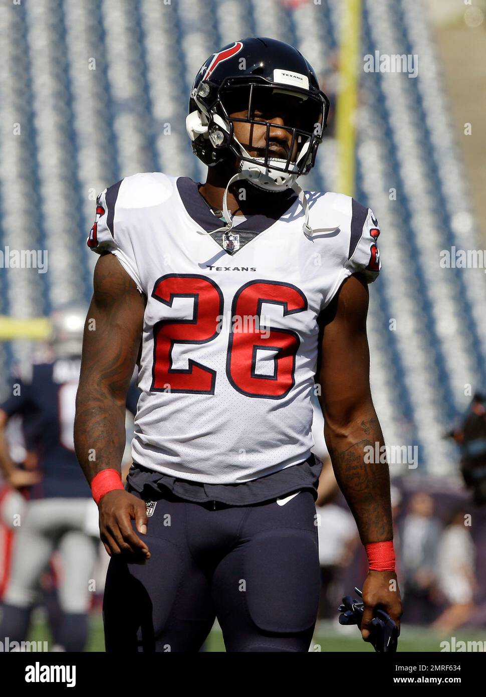 Houston Texans running back Lamar Miller pauses during warm-up's before ...