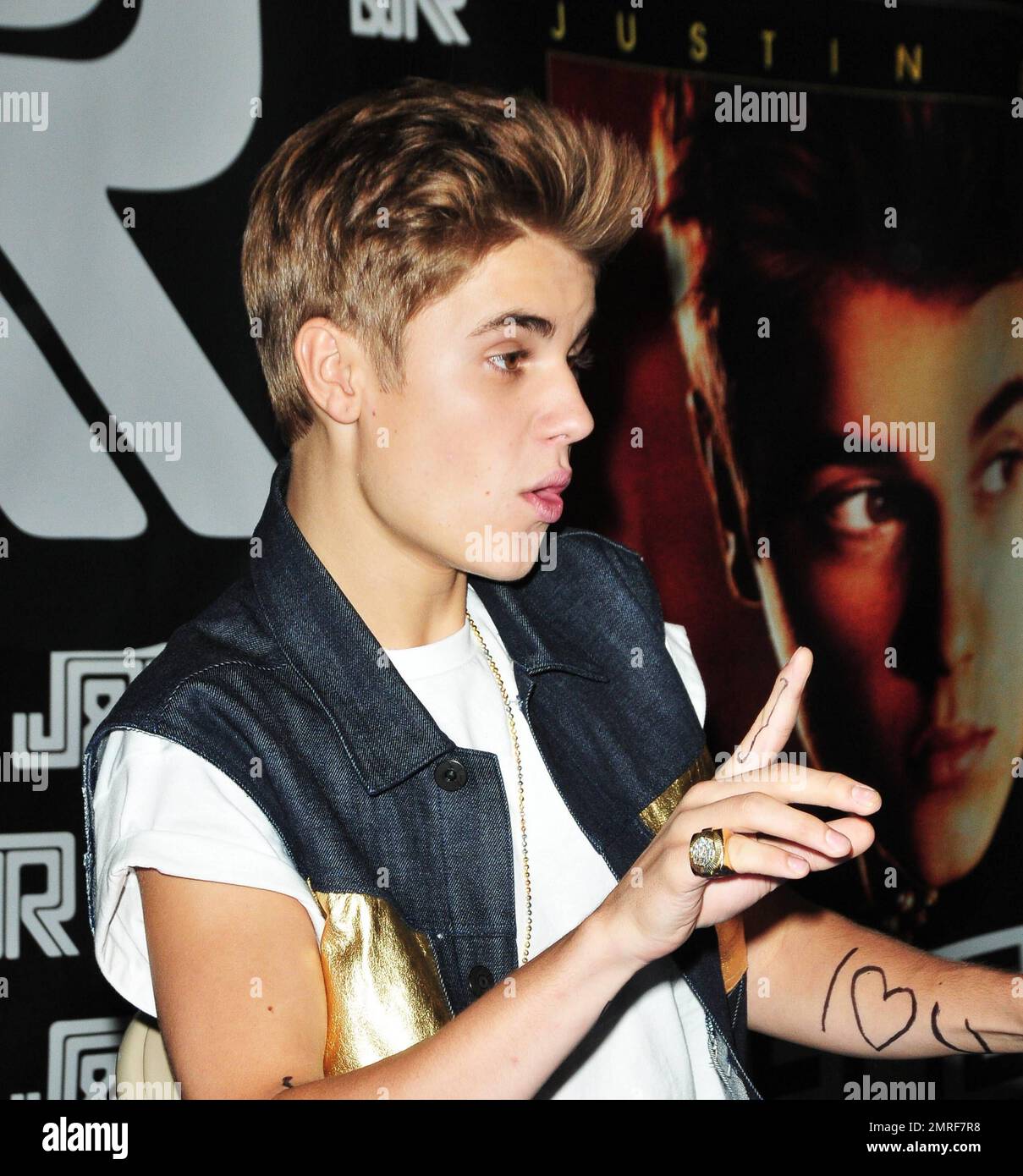 Justin Bieber at a cd signing for 'Believe' at JR Music Justin Bieber at a cd signing for 'Believe' at JR Music