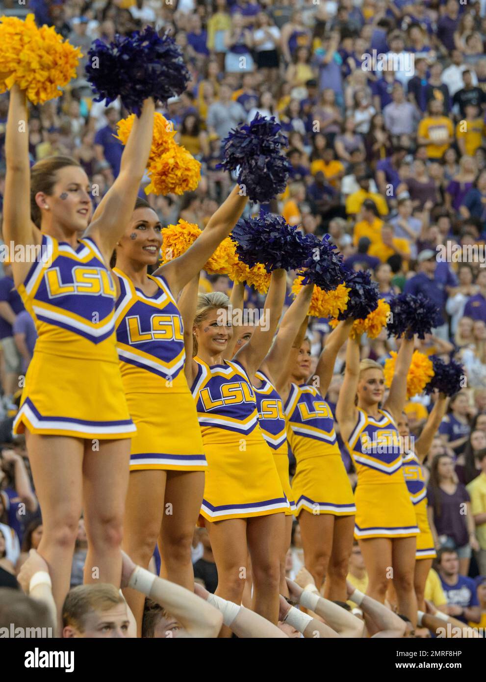 LSU cheerleaders perform against Syracuse in an NCAA college football ...