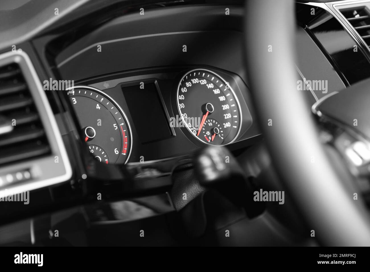 Wheel and dashboard in modern car, closeup view Stock Photo - Alamy