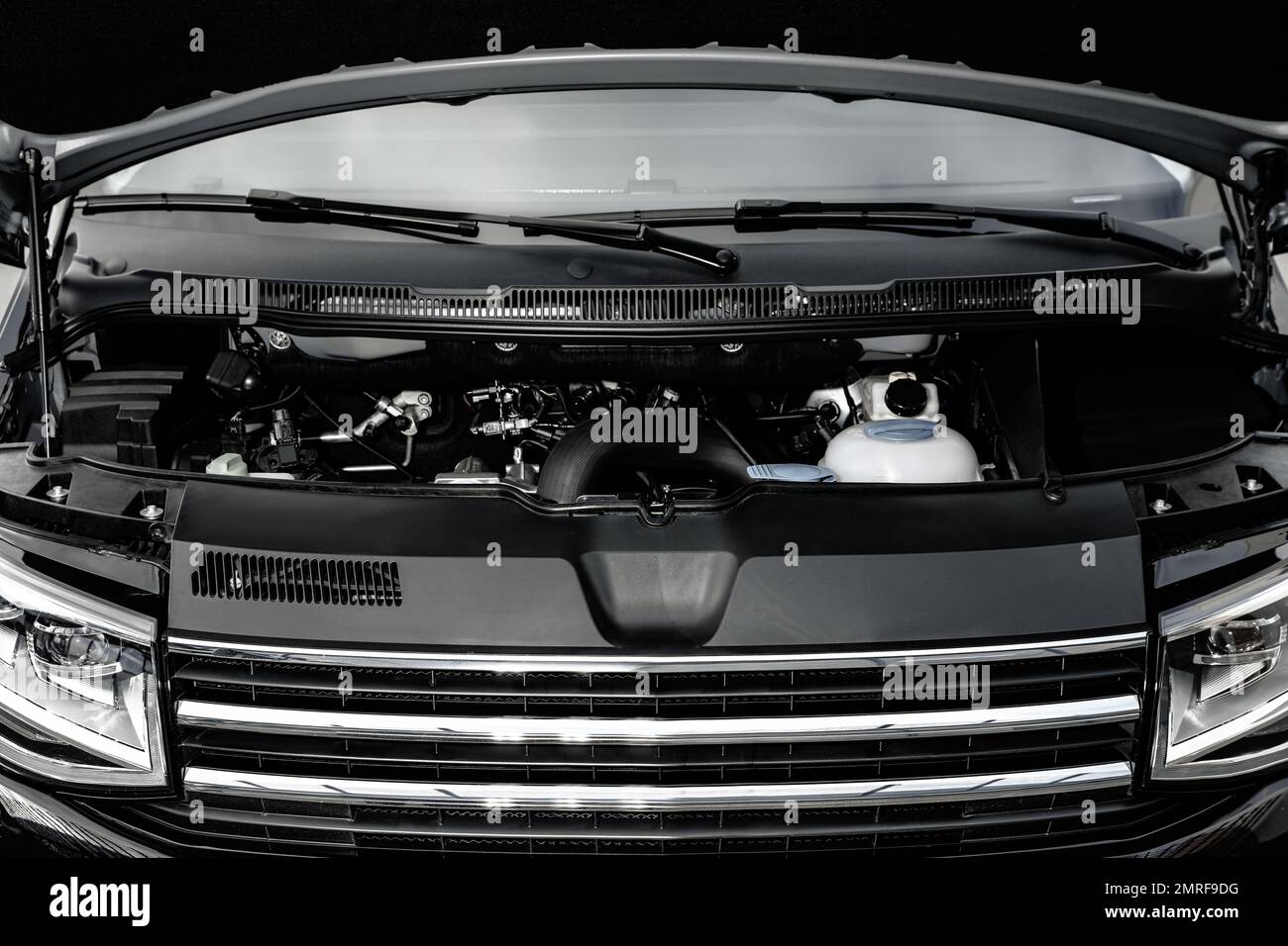Closeup view of engine bay in modern car Stock Photo - Alamy
