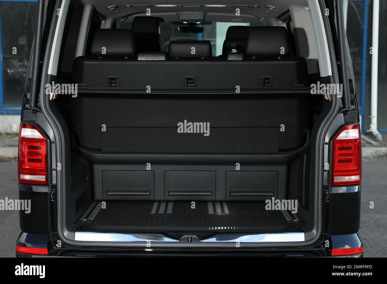 Modern car with open empty trunk outdoors Stock Photo - Alamy