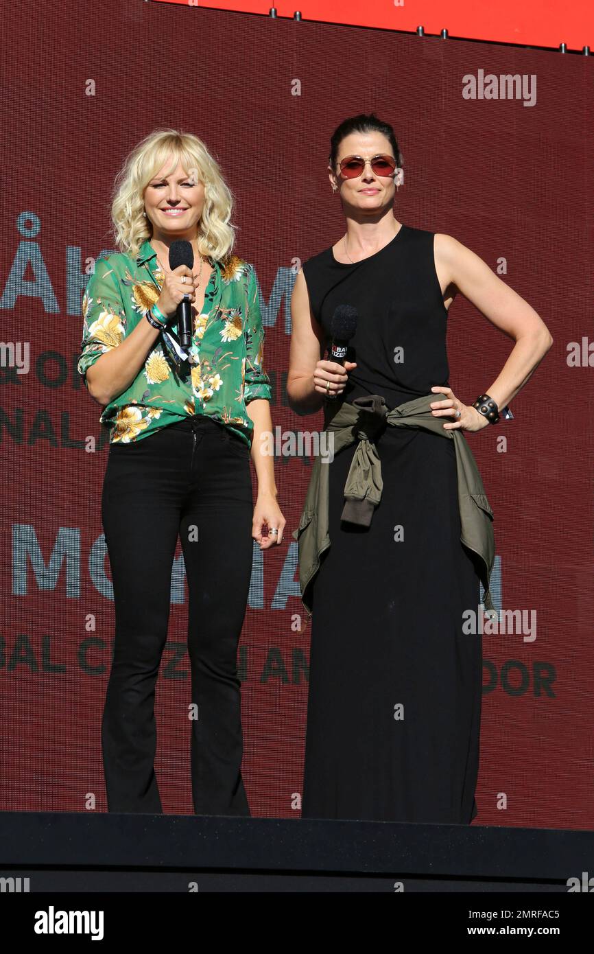 Malin Akerman, left, and Bridget Moynahan speak at the Global Citizen ...