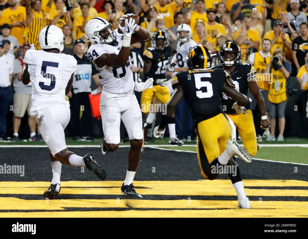Penn State wide receiver Juwan Johnson (84) catches a touchdown pass ...