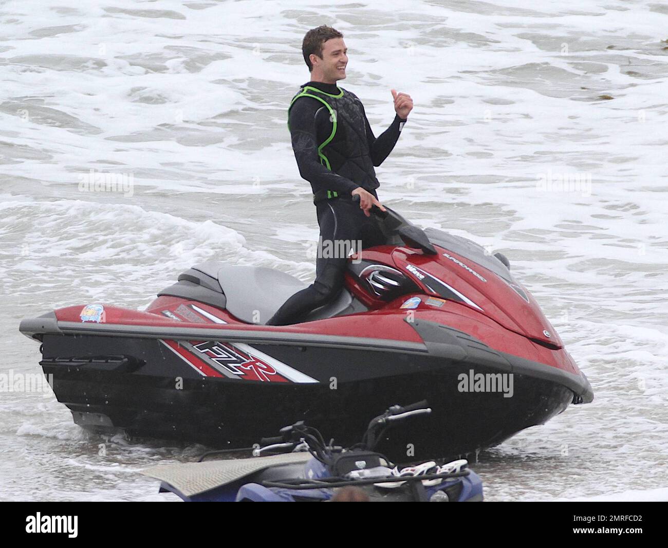 Justin Timberlake speeds around the ocean on a jet-ski while filming a ...