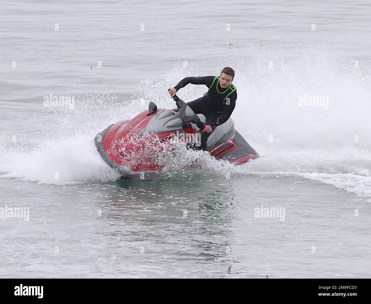 Justin Timberlake speeds around the ocean on a jet-ski while filming a ...