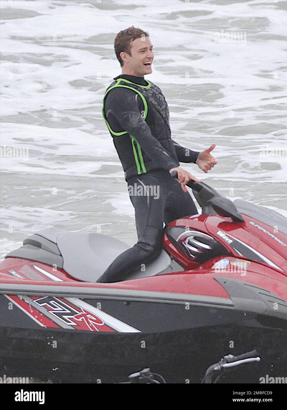 Justin Timberlake speeds around the ocean on a jet-ski while filming a ...