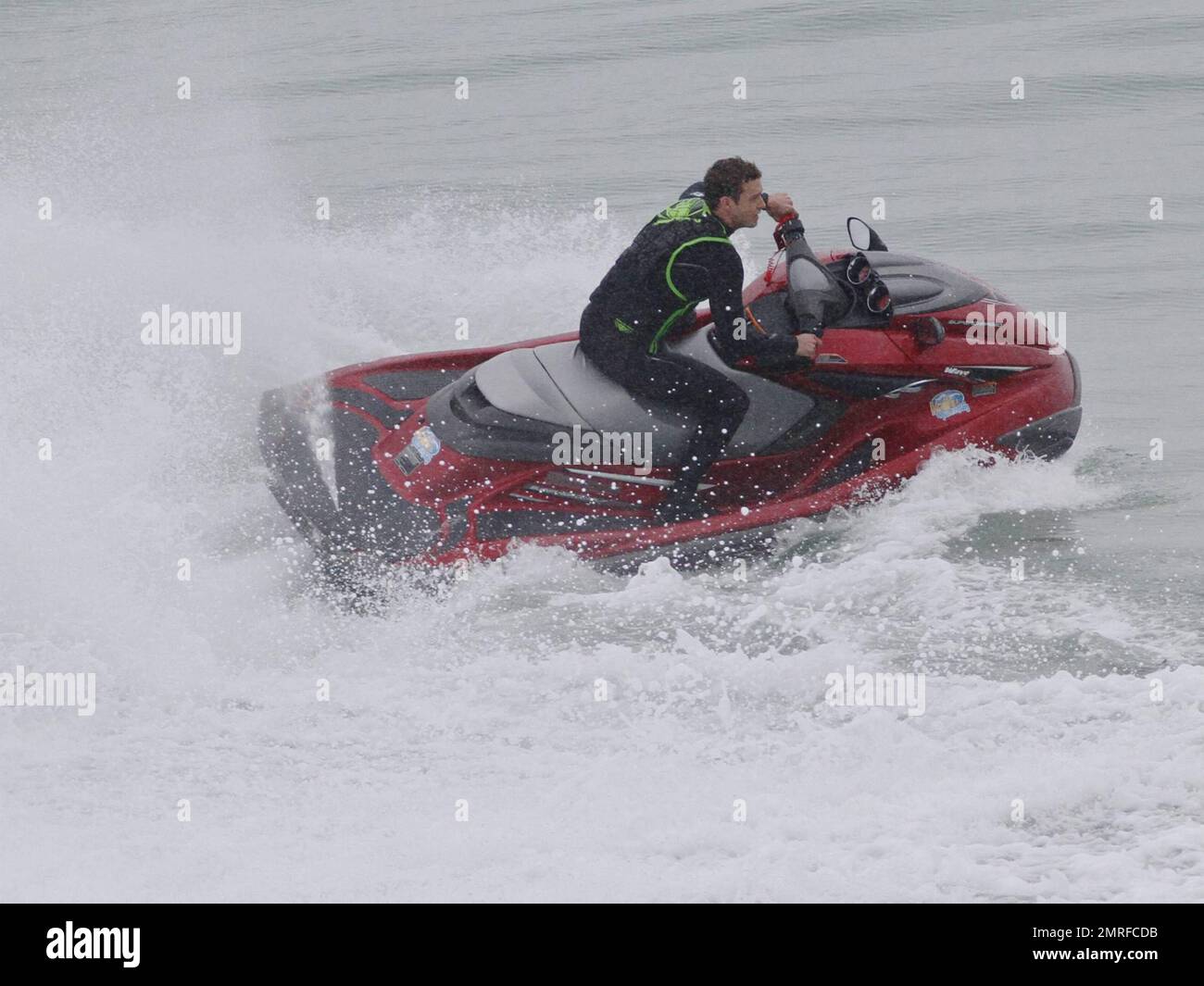 Justin Timberlake speeds around the ocean on a jet-ski while filming a ...