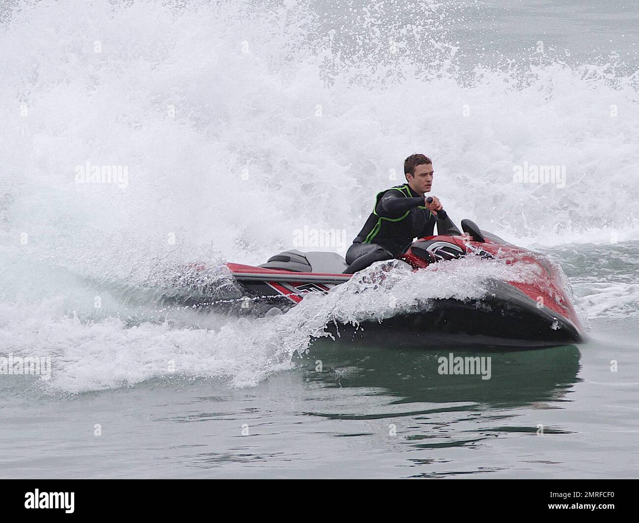Justin Timberlake speeds around the ocean on a jet-ski while filming a ...