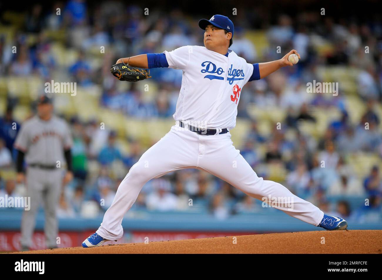 Los Angeles Dodgers starting pitcher Hyun-Jin Ryu winds up during the ...