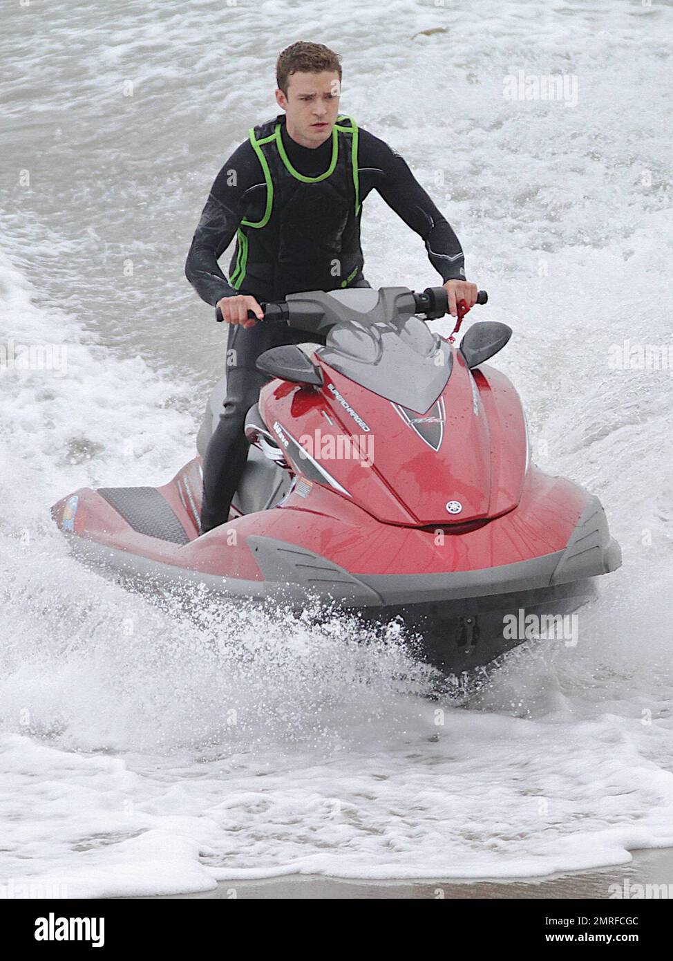 Justin Timberlake speeds around the ocean on a jet-ski while filming a ...