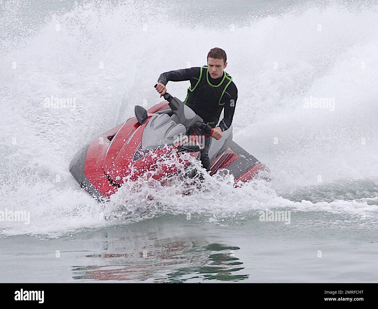 Justin Timberlake speeds around the ocean on a jet-ski while filming a ...