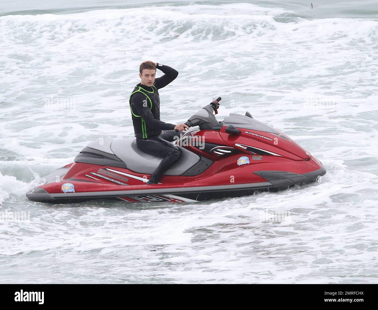 Justin Timberlake speeds around the ocean on a jet-ski while filming a ...