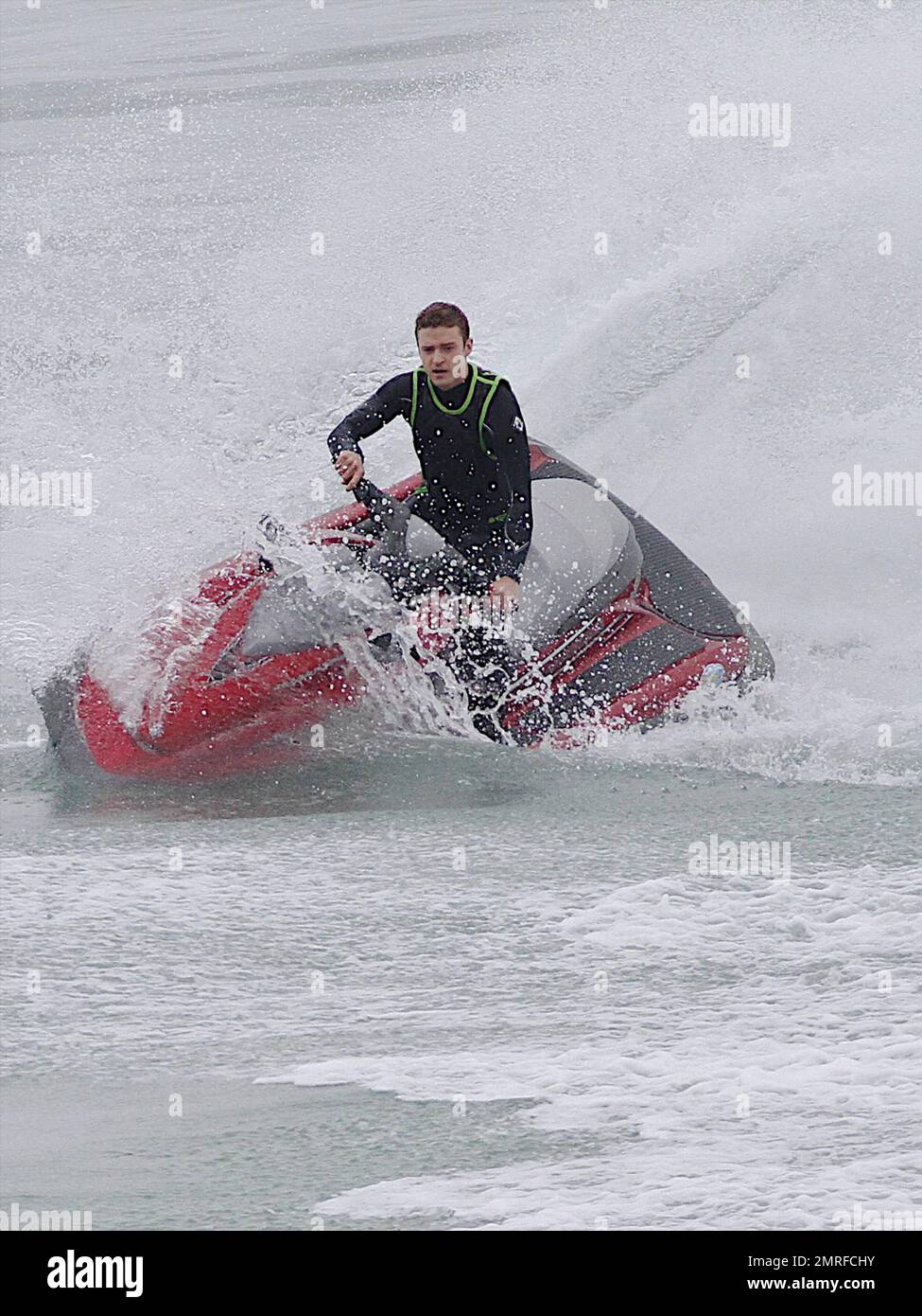 Justin Timberlake speeds around the ocean on a jet-ski while filming a ...