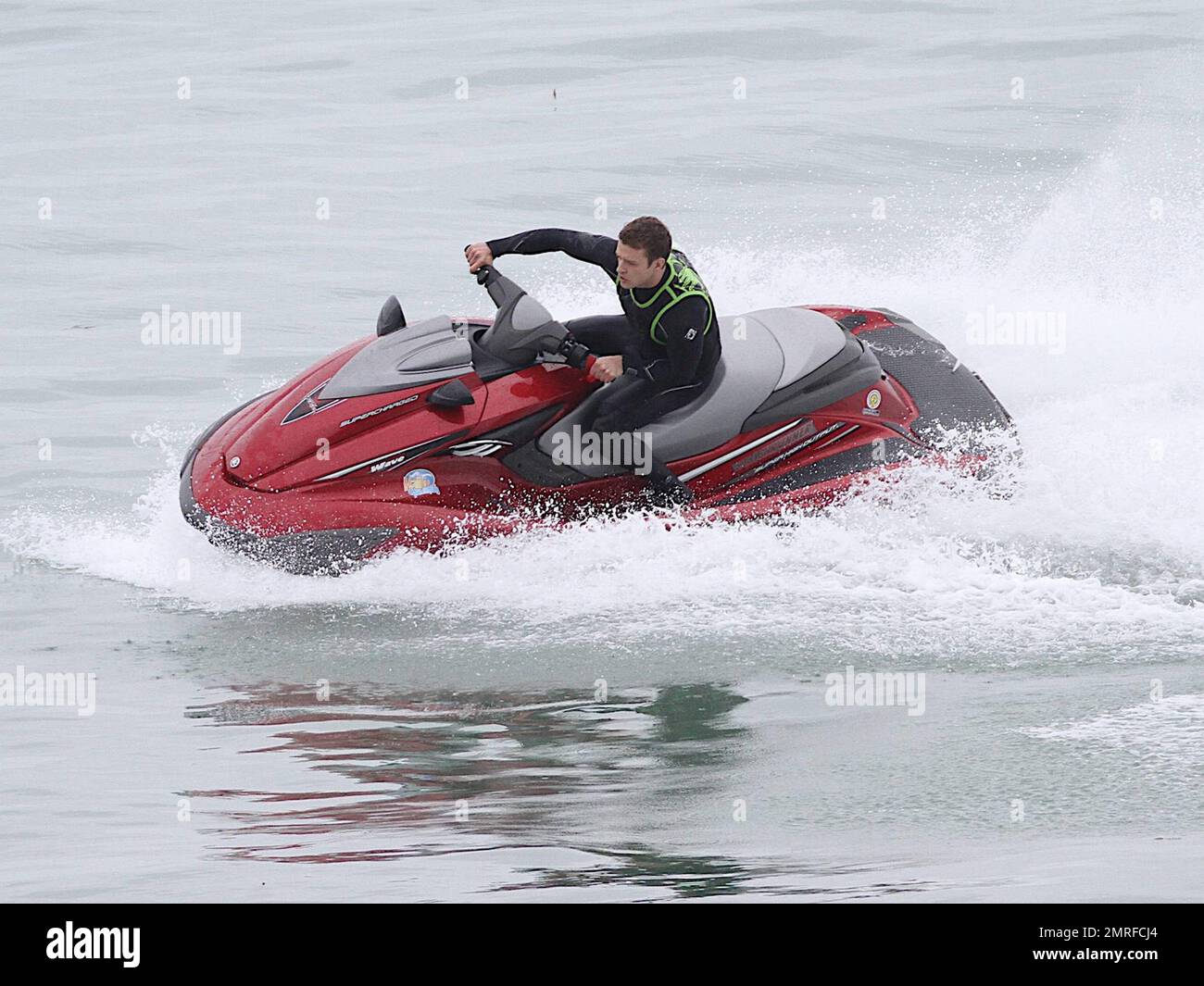 Justin Timberlake speeds around the ocean on a jet-ski while filming a ...