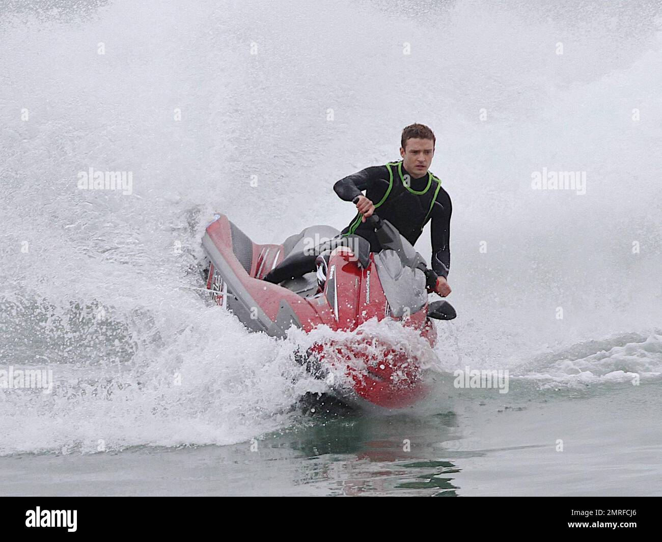 Justin Timberlake speeds around the ocean on a jet-ski while filming a ...