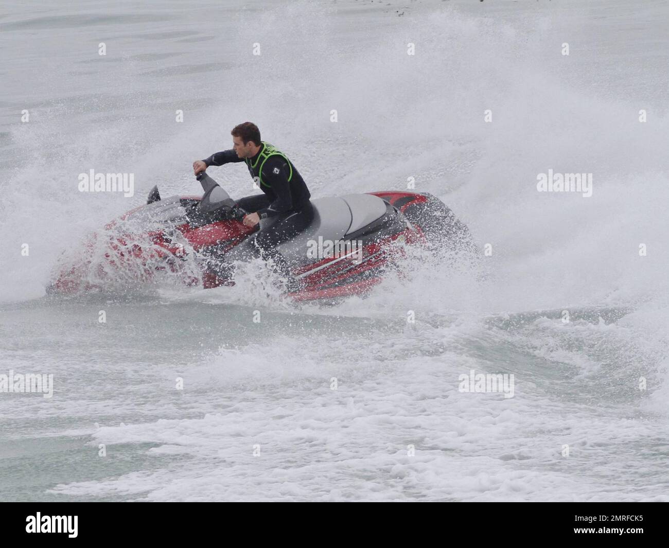 Justin Timberlake speeds around the ocean on a jet-ski while filming a ...