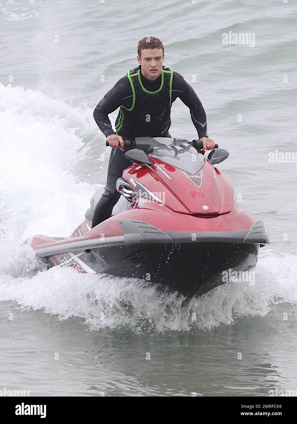 Justin Timberlake speeds around the ocean on a jet-ski while filming a ...
