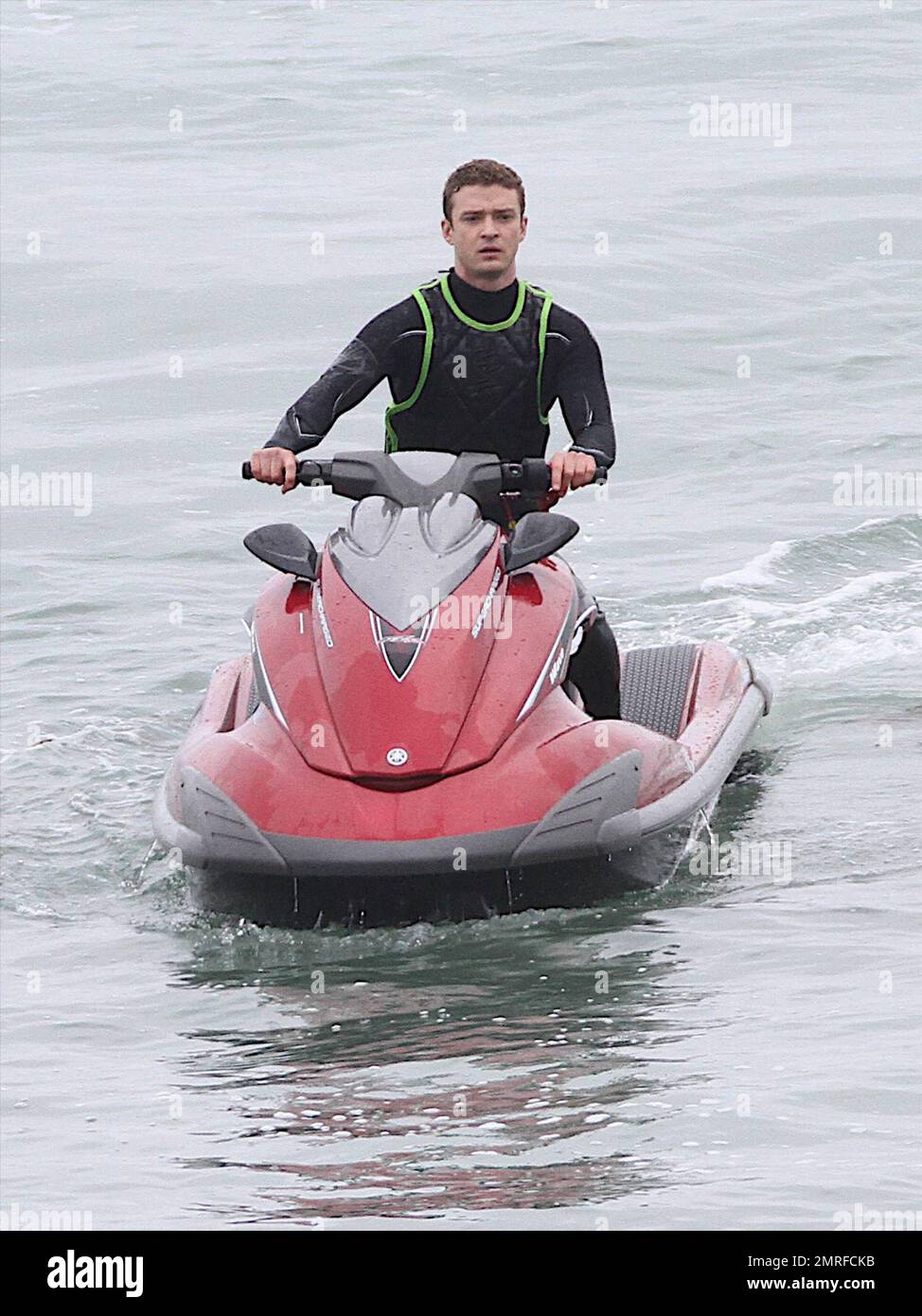 Justin Timberlake speeds around the ocean on a jet-ski while filming a ...