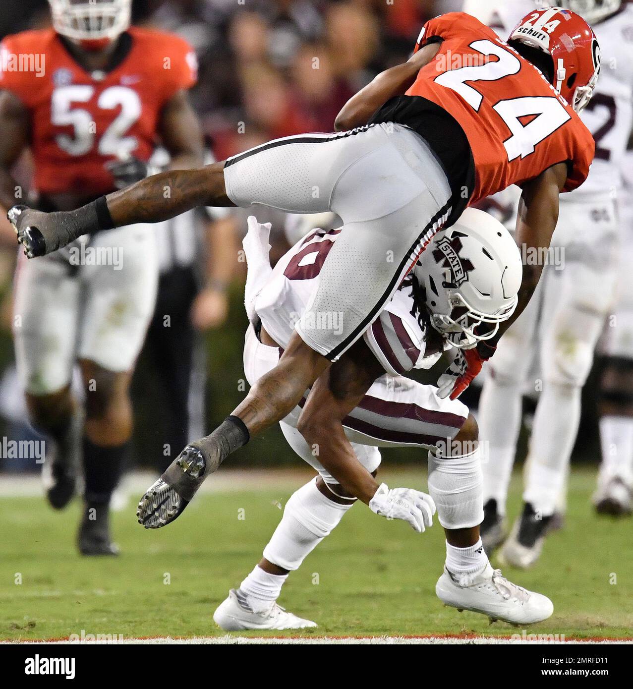 Mississippi State wide receiver Deddrick Thomas (18) runs into Georgia ...
