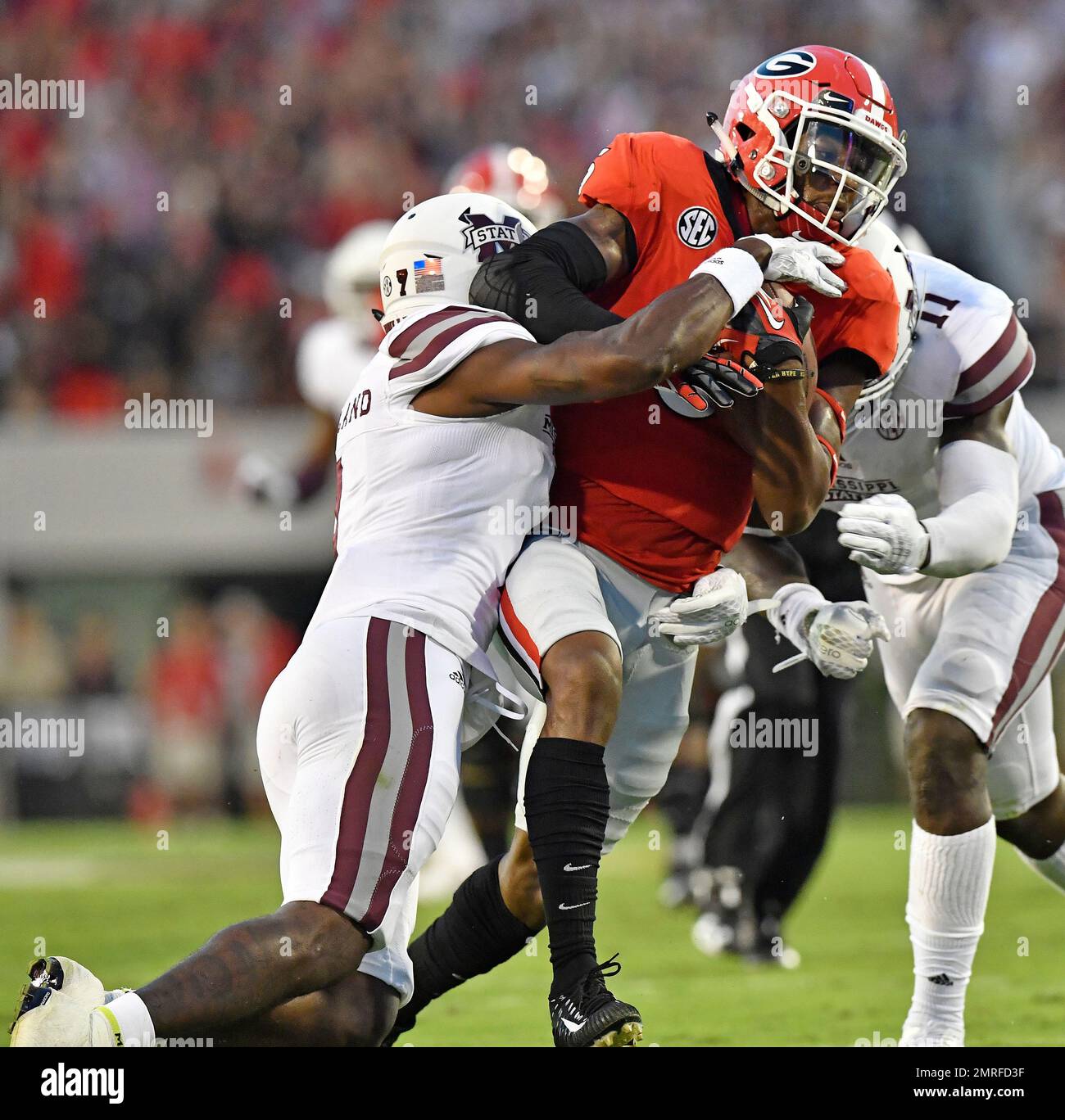Mississippi State defensive back Tolando Cleveland (7) and linebacker ...