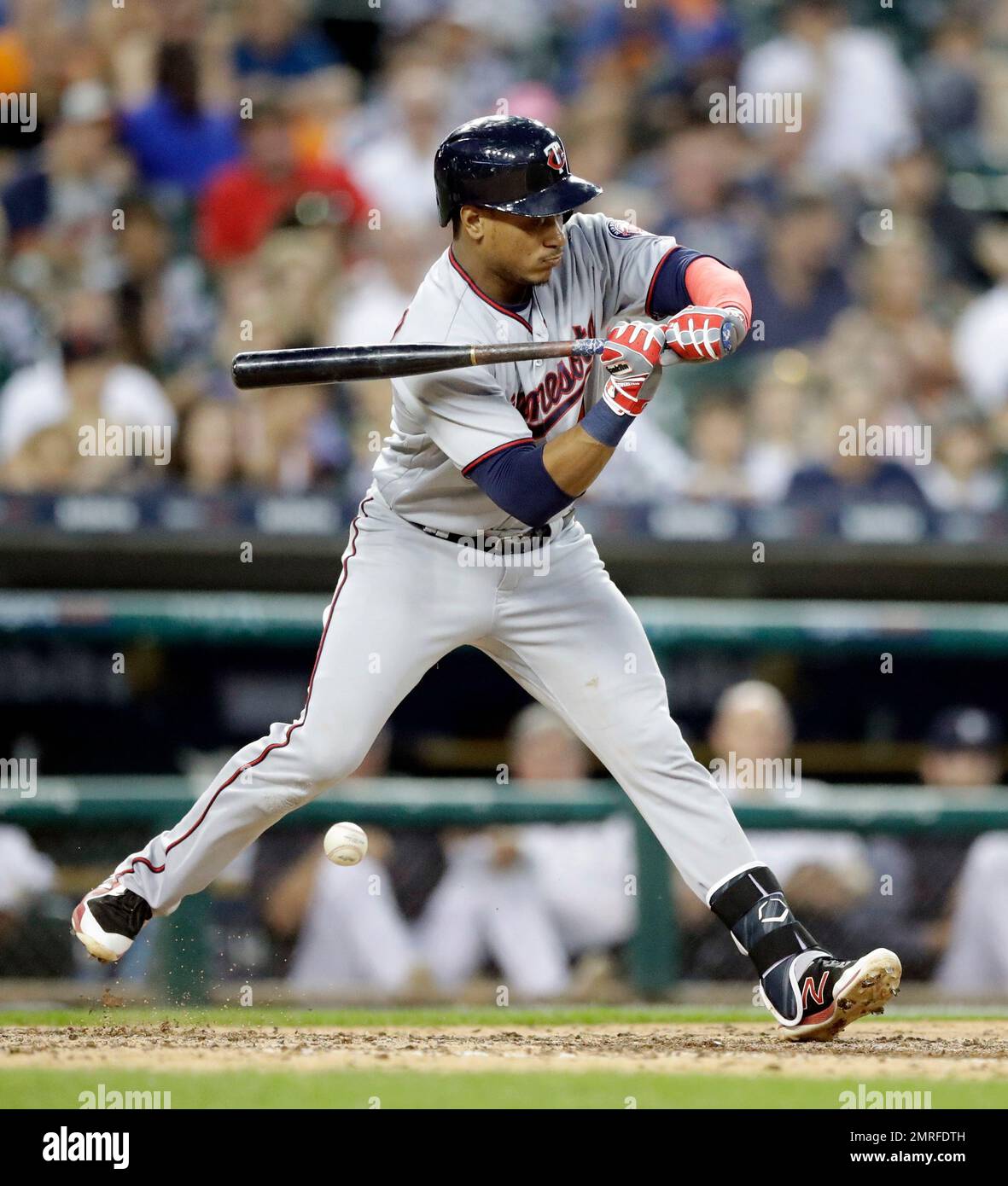 Minnesota Twins' Jorge Polanco is hit by a pitch during the sixth ...