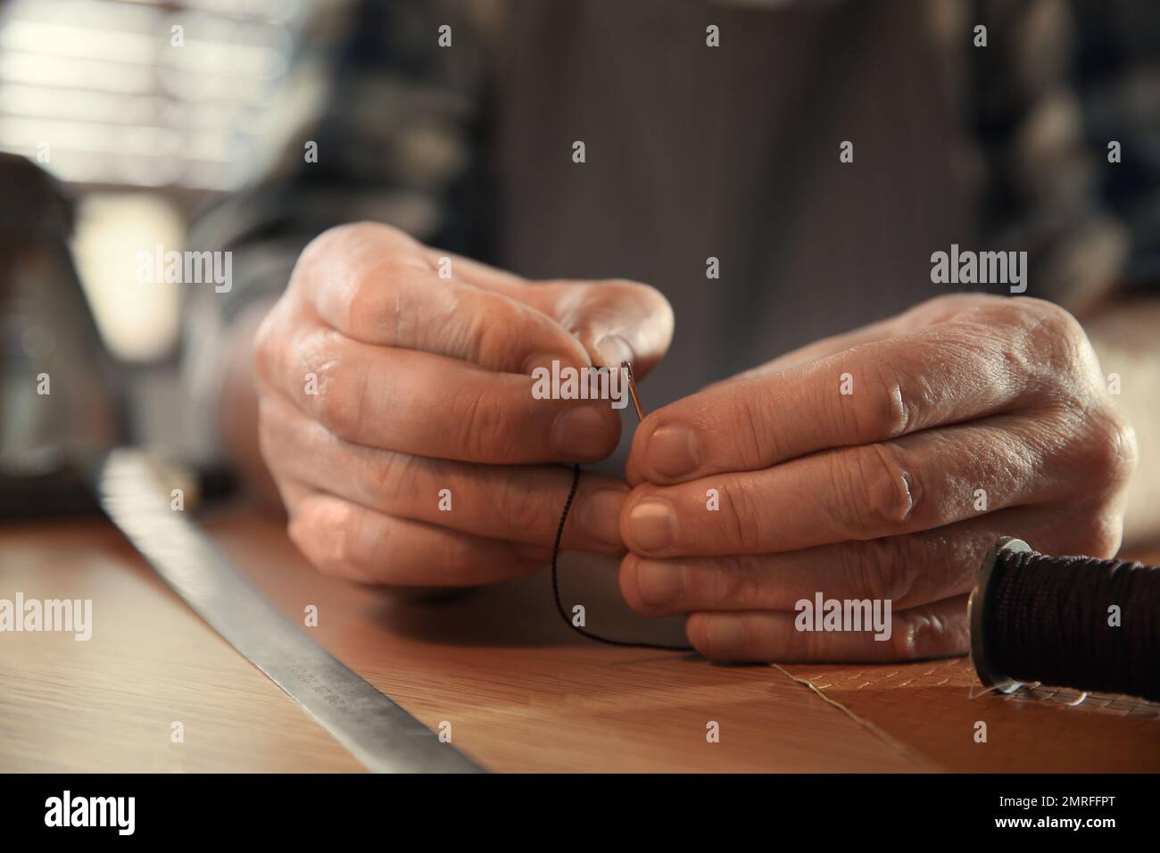 Threading needle hi-res stock photography and images - Alamy