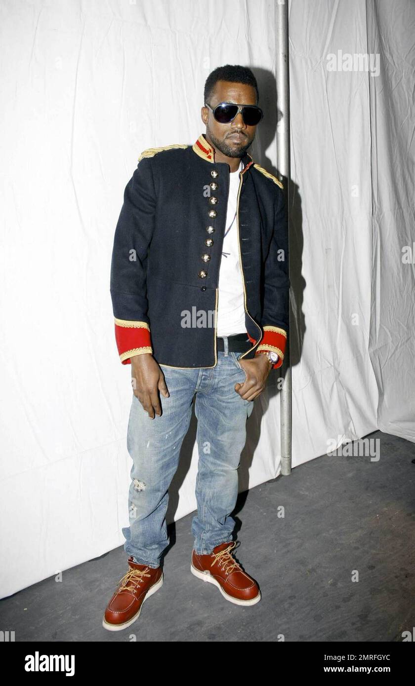 Singer Amber Rose and rapper Kanye West attend the Alexander ...