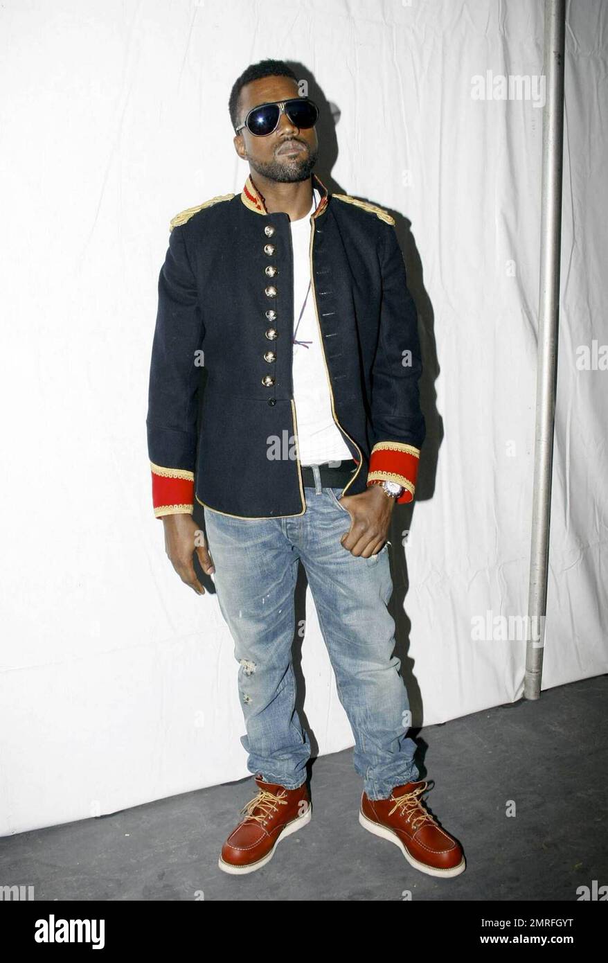 Singer Amber Rose and rapper Kanye West attend the Alexander ...