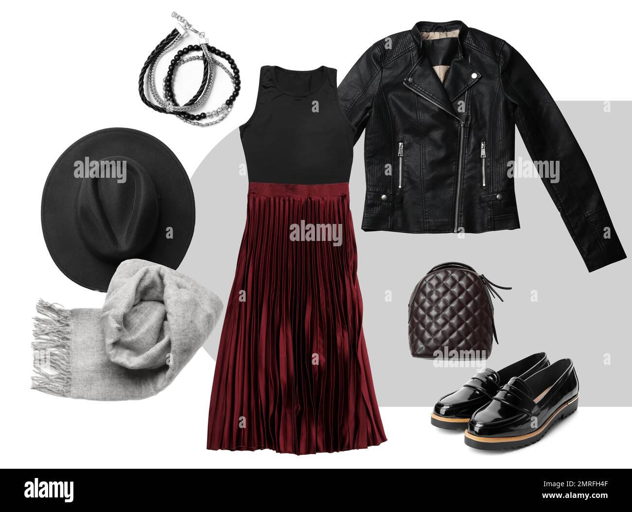 Stylish outfit with black leather jacket on white background Stock ...