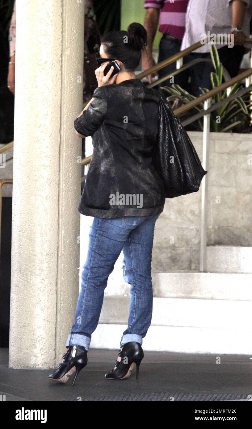 EXCLUSIVE!! Kim Kardashian arrives at her hotel bearing gifts for her ...