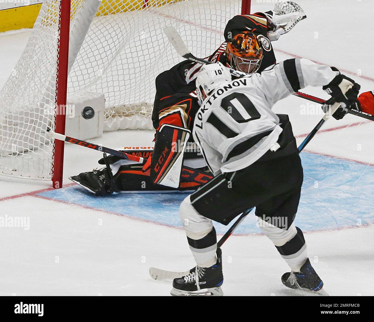 Anaheim Ducks goalie Ryan Miller deflects a shot by Los Angeles Kings ...
