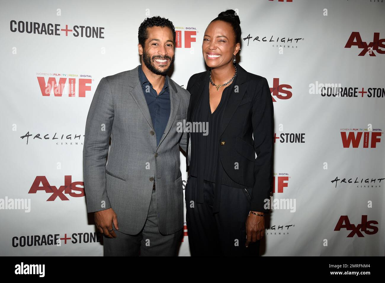 Nelson Estevez, left, and Aisha Tyler attend a panel discussion for ...
