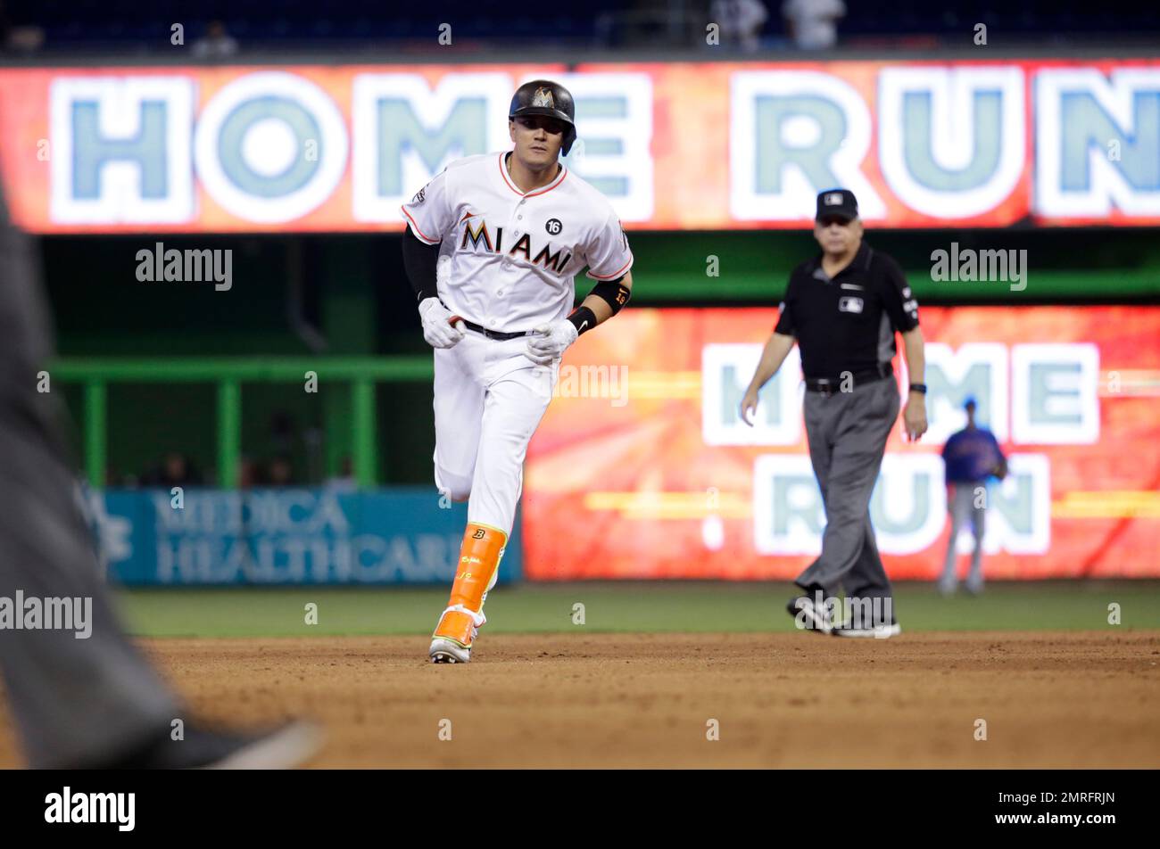 Miami Marlins' Miguel Rojas runs the bases after hitting a solo home ...