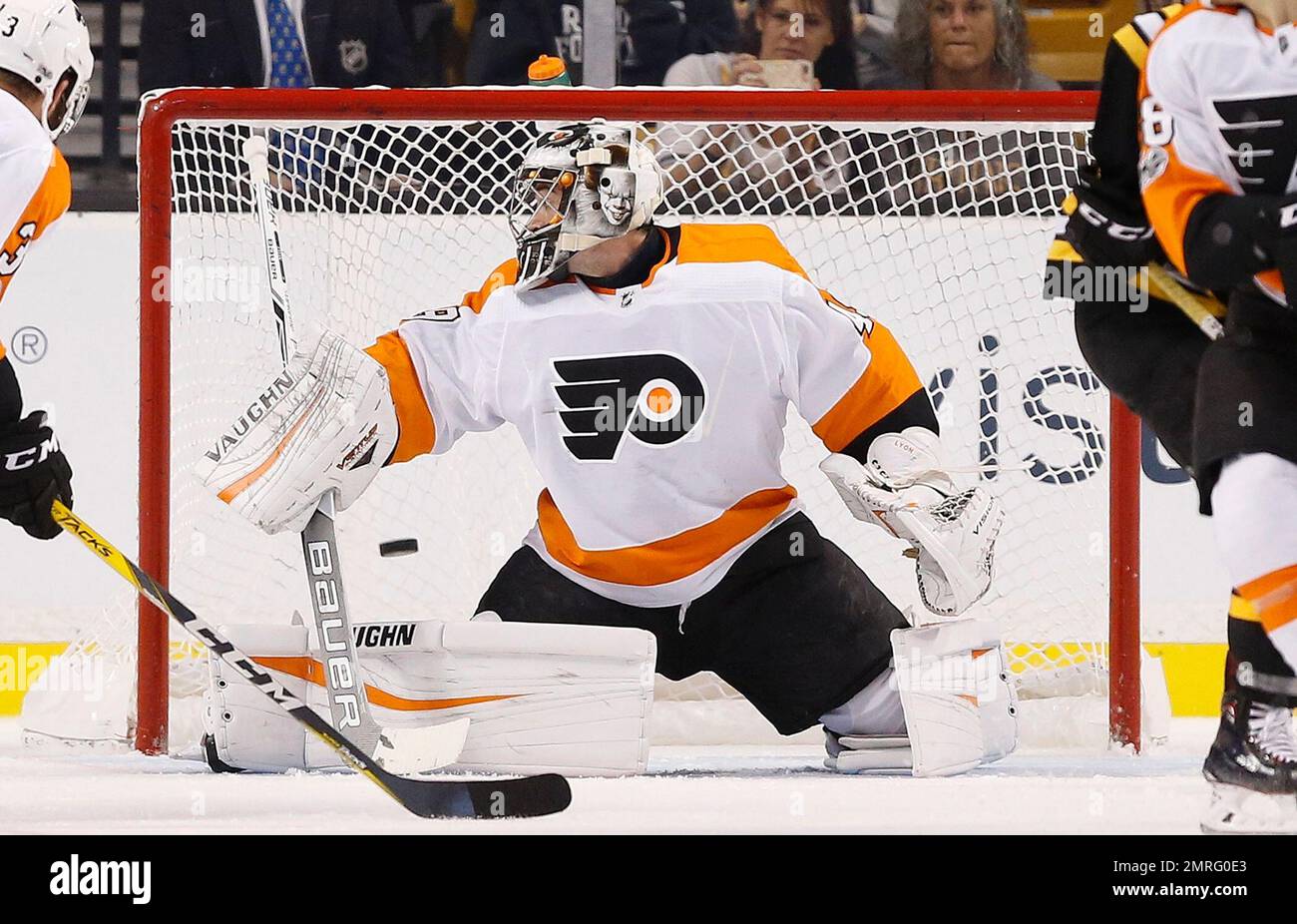 Philadelphia Flyers' Alex Lyon looks back at the scoring shot by Boston ...