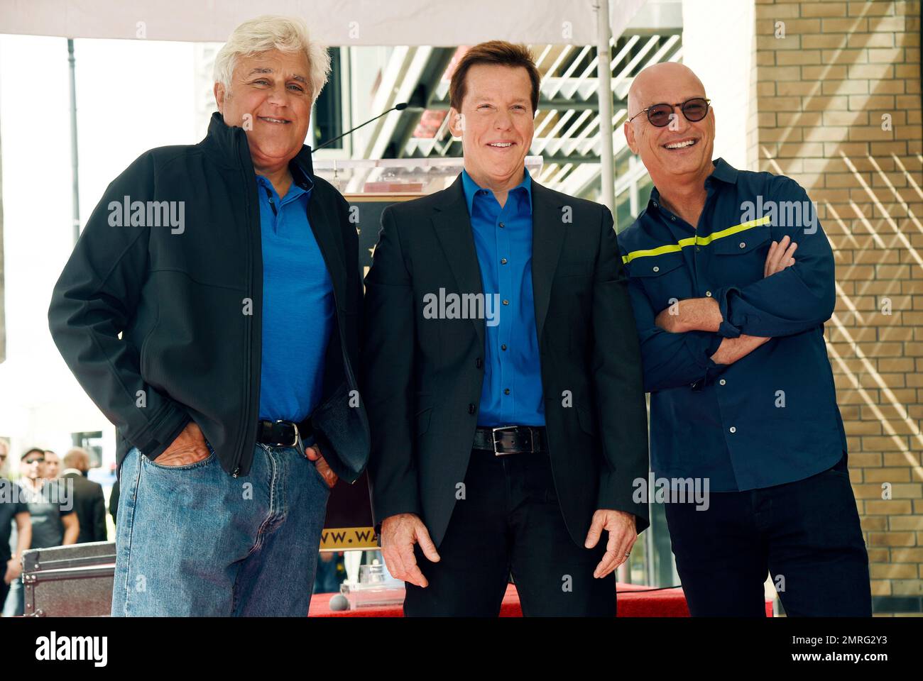 Ventriloquist Jeff Dunham, center, poses with comedians Jay Leno, left ...