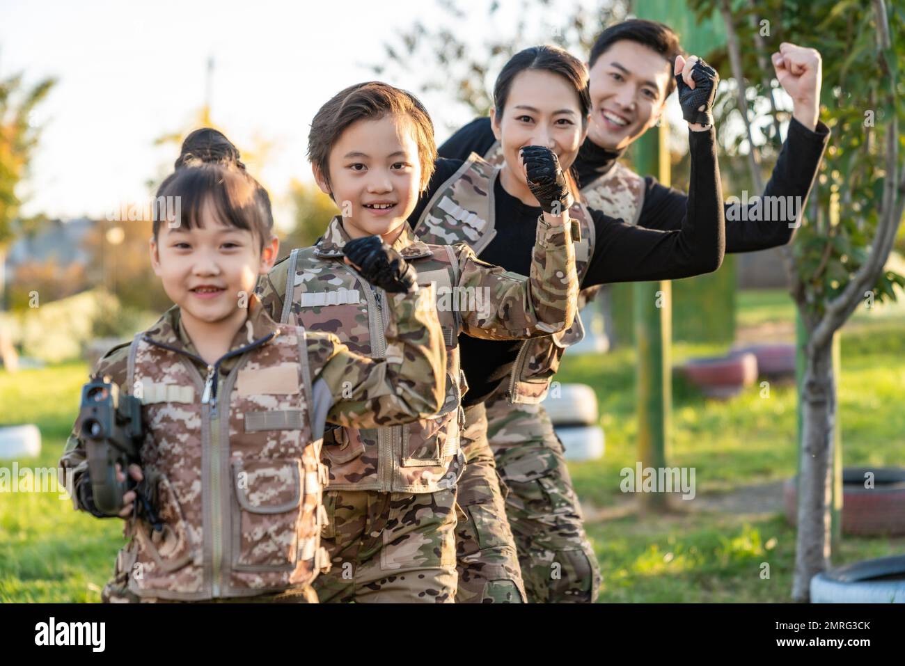 Happy family play cs Stock Photo - Alamy