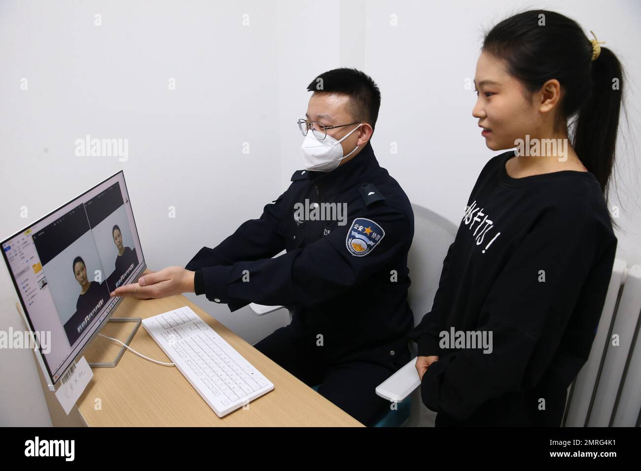 JINAN, CHINA - JANUARY 31, 2023 - Auxiliary police let people choose ...