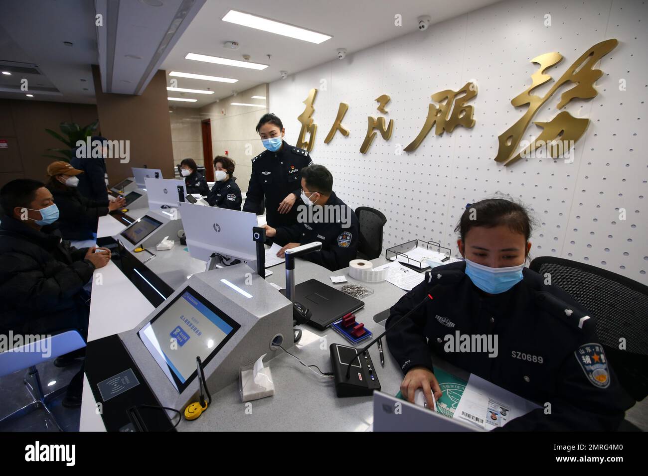 JINAN, CHINA - JANUARY 31, 2023 - Police officers handle entry and exit ...