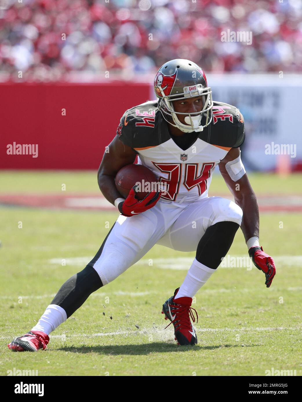Tampa Bay Buccaneers running back Charles Sims (34) runs the ball ...
